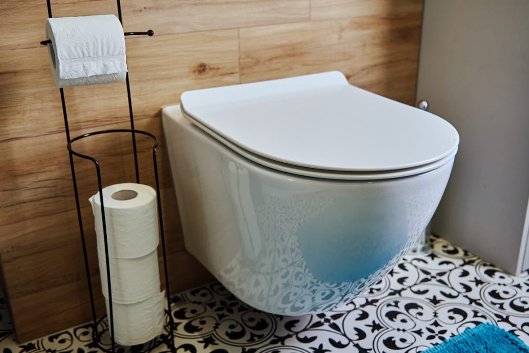 Should You Tile Around a Toilet or Under It? - This Must Be Home
